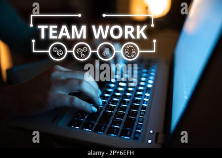 Text caption presenting Team Work, Internet Concept Combined action of ...