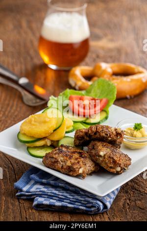 bavarian minced meat fleischpflanzerl Stock Photo - Alamy