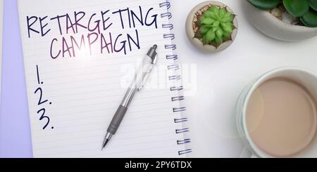 Hand writing sign Retargeting Campaign. Business concept ...
