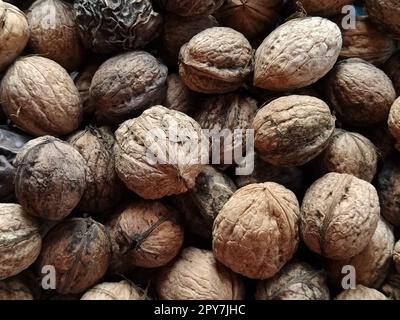 Top view of lots of walnut with its shell Stock Photo - Alamy