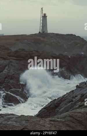 Stokksnes lighthouse on cliff at storm landscape photo Stock Photo - Alamy