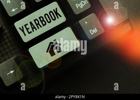 Text sign showing Yearbook. Concept meaning publication compiled by ...
