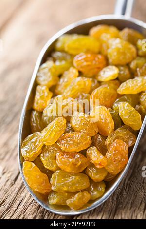 Golden Seedless Sultana Raisins in Metal Scoop Stock Photo - Alamy