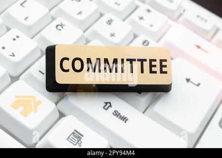 Conceptual caption Committee. Word Written on Group of people appointed ...