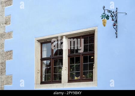Golden grapes hanging sign in Rothenburg Stock Photo - Alamy