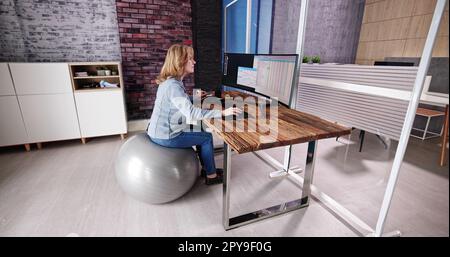 Correct Posture At Desk In Office Stock Photo - Alamy