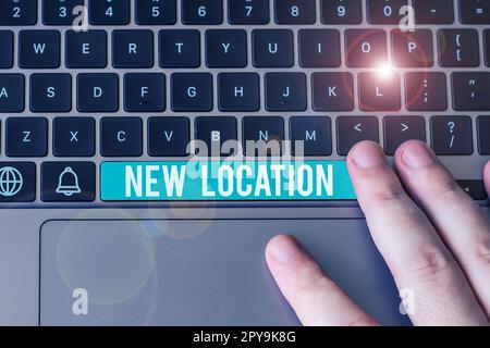 Hand writing sign New Location. Internet Concept Get located on a new ...