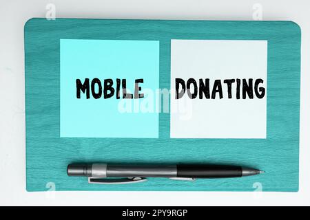 Sign displaying Mobile Donating, Internet Concept to give something to ...