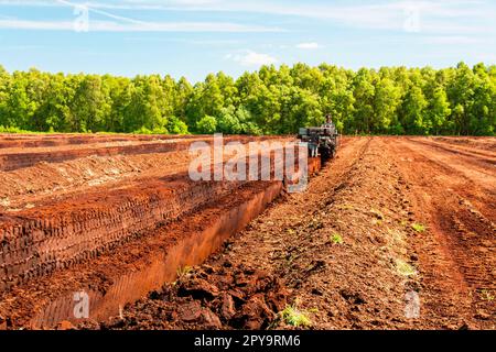 Industrial peat cutting Stock Photo - Alamy
