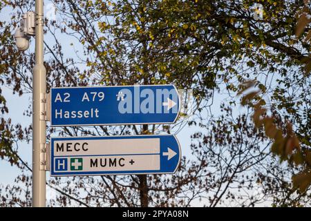 Picture of a dutch roadsign indicating various directions, notably the ...