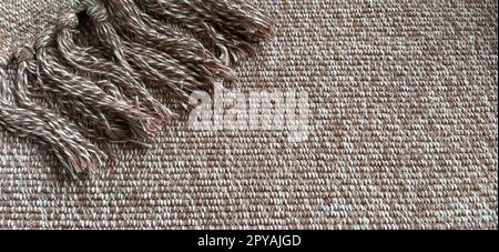 Woven fabric with tassels. Coarse weaving cotton. Floor mat. Beige ...