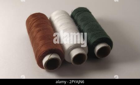 bobbins of thread isolated on white Stock Photo - Alamy