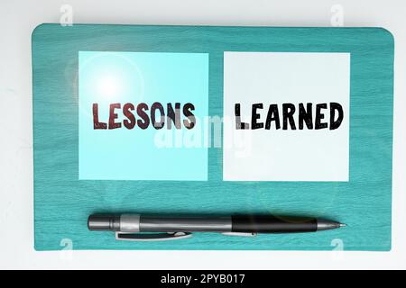 Sign displaying Lessons Learned, Business showcase Promote share and ...