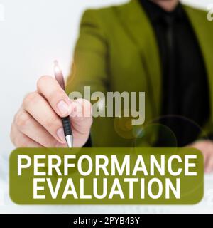 Writing displaying text Performance Evaluation. Concept meaning the development and action ...