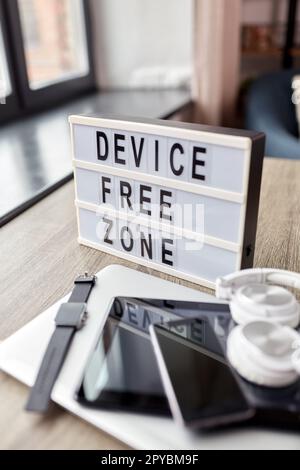 gadgets and device free zone words on light box Stock Photo - Alamy