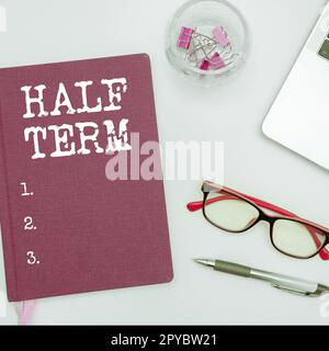 Text sign showing Half Term. Word for half the usual price at which ...