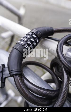 Cyber security. Metal combination padlock with chain and credit cards ...