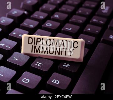 Hand writing sign Diplomatic Immunity. Business concept law that gives ...