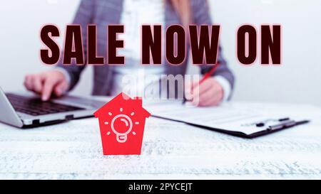 Sign displaying Sale Now On. Business approach Reduction of prices ...