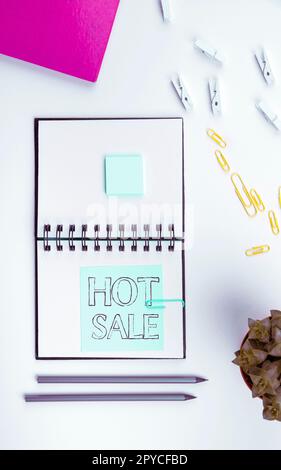 Writing displaying text Hot Sale. Word Written on putting products on ...