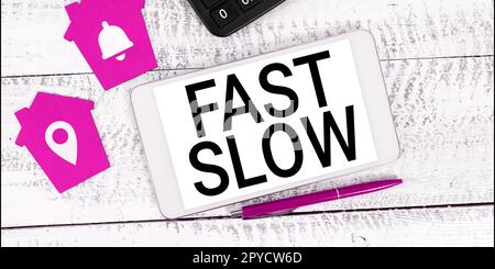 Writing displaying text Fast Slow. Conceptual photo moving or ...