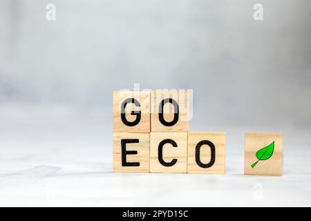 ECO text on wooden cubes as an environmentally friendly business ...