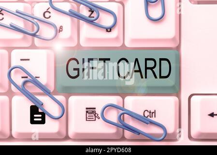 Hand writing sign Gift Card. Concept meaning A present usually made of ...