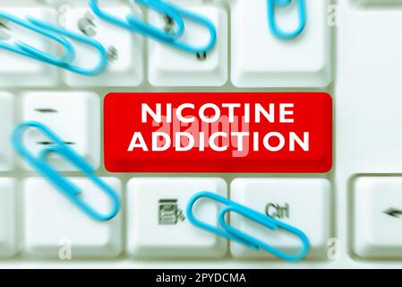 Sign displaying Nicotine Addiction. Business overview condition of ...