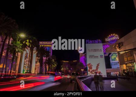 Gorgeous out-of-focus tracers of Strip road. Night Las Vegas cityscape view. Nevada, Las Vegas ...