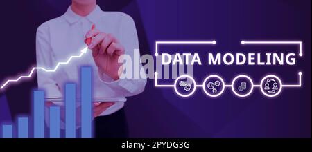 Hand writing sign Data Modeling. Internet Concept process of transferring data between data ...