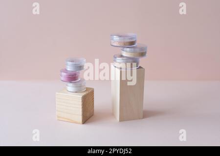 Mineral loose face powder on pastel background. Eyeshadows and blush ...