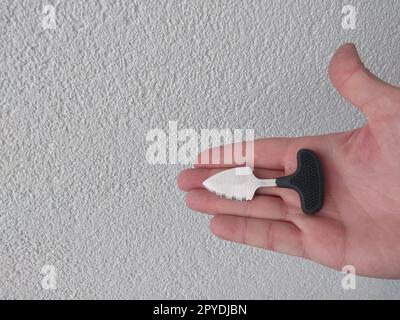 Poke knife for self-defense in the hand of a man Stock Photo - Alamy