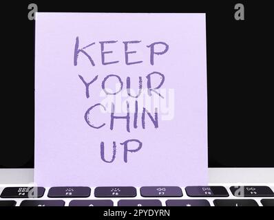 Writing displaying text Keep Your Chin UpRemain cheerful in difficult ...