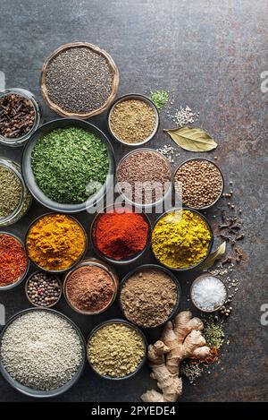 Colorful herbs and spices for cooking dishes. Indian and Asian spices ...