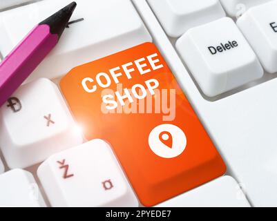 Text sign showing Coffee Shop. Concept meaning a restaurant that ...