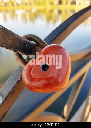 Close-up photo of the red railing along an elevated indoor running ...