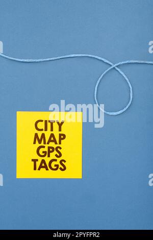 Hand writing sign City Map Gps Tags. Word for global positioning system ...