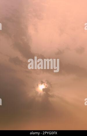 Sky, with diffused sun clouds colourful Stock Photo - Alamy