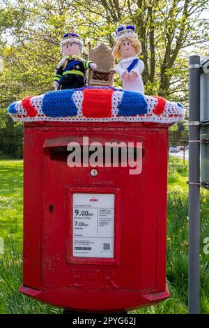 A knitted tribute to King Charles and Queen Camilla on a suburban ...