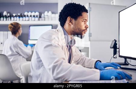 African scientist man, green screen and computer in research, reading ...