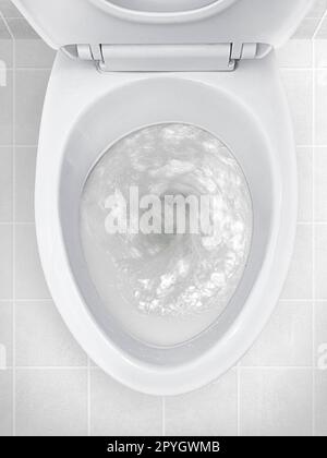 Toilet, flushing water, close-up. white toilet Stock Photo - Alamy