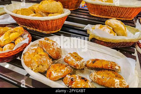 Rolls baguettes cakes and other pastries in Chedraui Supermarket Mexico ...