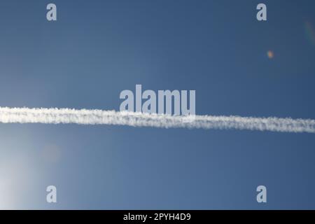 Kerosene strips from an airplane in the Spanish sky in Alicante ...