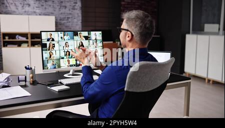 Clapping In Virtual Video Conference Call On Computer Stock Photo - Alamy