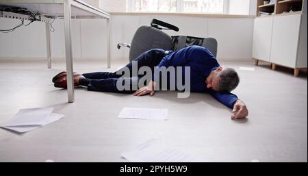 Faint Accident In Office. Fall From Chair Stock Photo - Alamy
