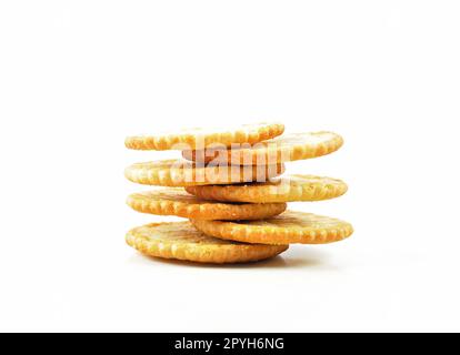 Salty crackers stacked on white background Stock Photo - Alamy
