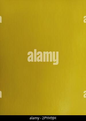 Nice yellow background. A sheet of paper close-up. Pure cheerful color ...