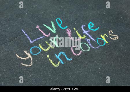 Live your life in colors, affirmation. Woman with rainbow umbrella ...