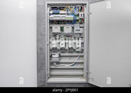 Fuse box with many electric meters and wires Stock Photo - Alamy