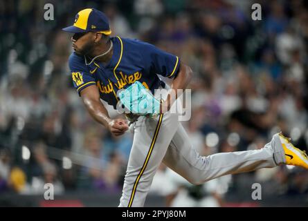 Milwaukee Brewers relief pitcher Elvis Peguero throws against the ...